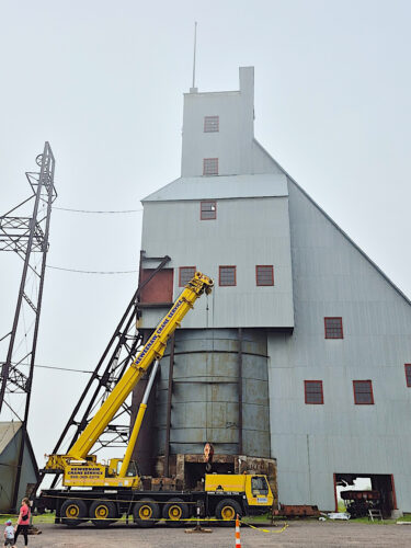 Long-awaited flag pole installed on Quincy Shafthouse | News, Sports ...